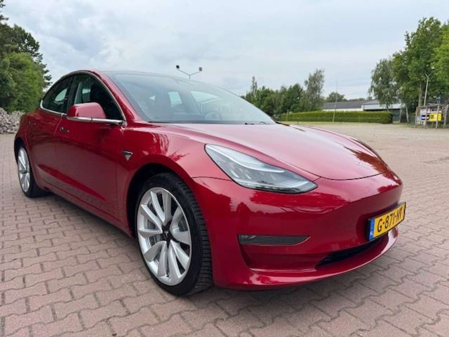 Tesla Model 3 occasion | Sedan | Rood | in VAASSEN voor € 23.900