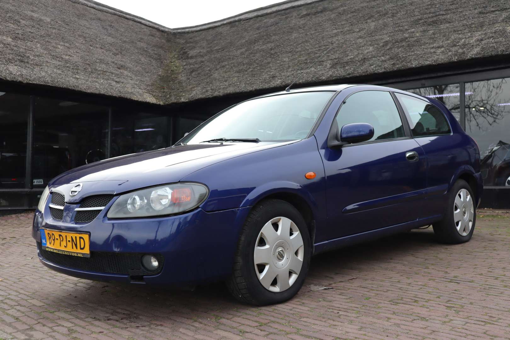 Nissan Almera occasion | Hatchback | Blauw | in GENEMUIDEN voor € 1.250,-