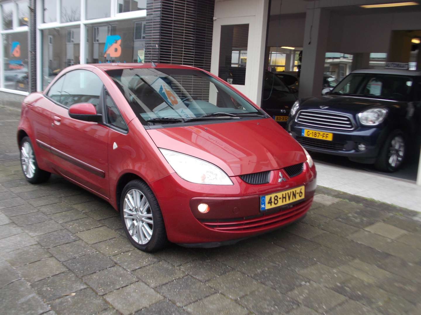 Mitsubishi Colt occasion | Cabrio | Rood | in HAARLEM voor € 3.995,-